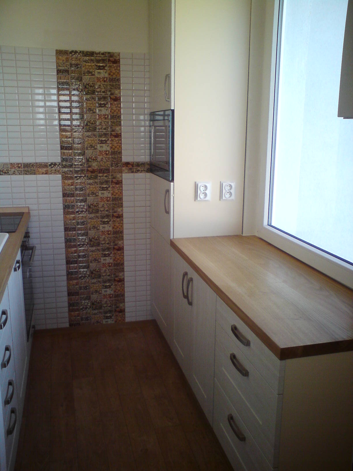 Obklady kuchyně - Obkladačské a zednické práce